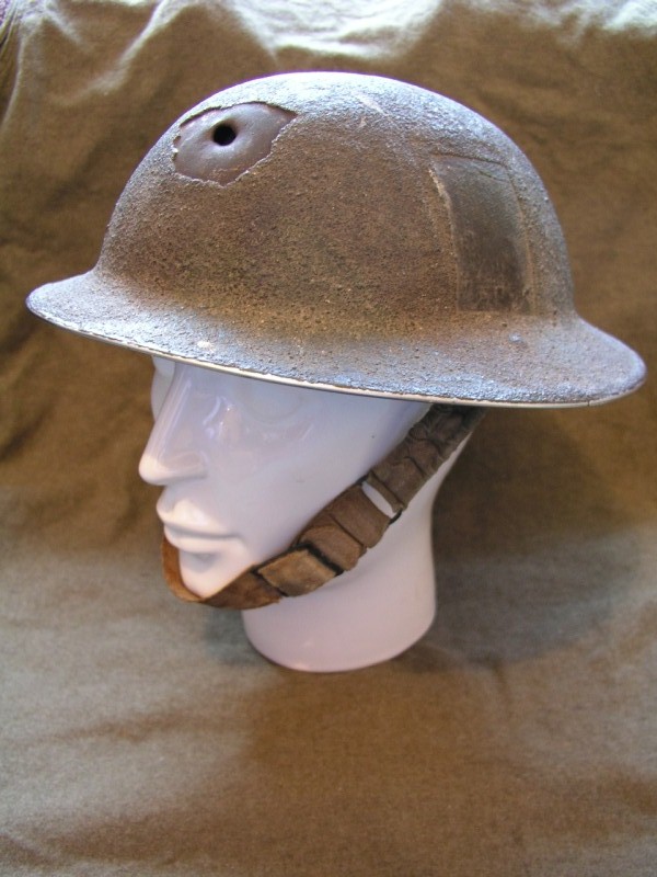 War Department Militaria | Extremely rare Battle damaged Mk II Steel Helmet